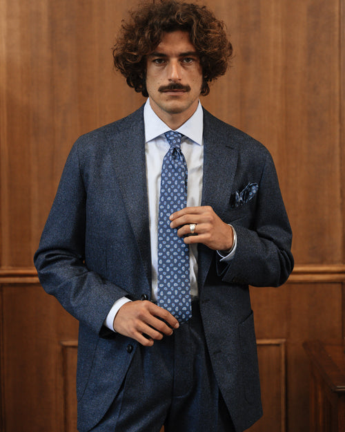 Velasca | Cravatta artigianale in seta. Blu con fantasia all over